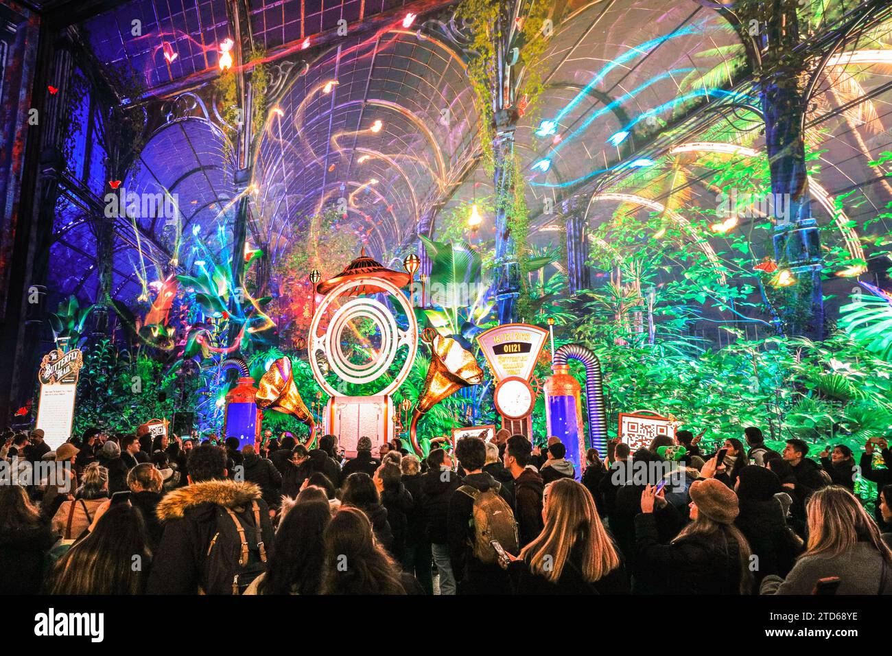 London, UK. 16th Dec, 2023. People watch the "The Butterfly Trail ...