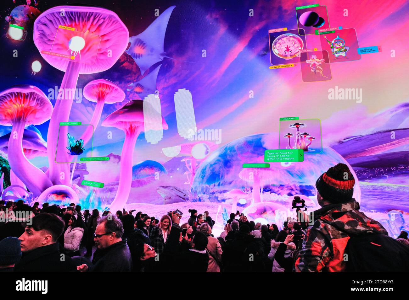 London, UK. 16th Dec, 2023. People watch the "The Lush Intergalactic ...