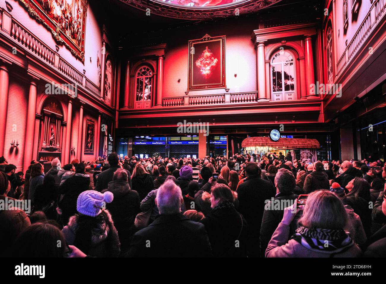 London, UK. 16th Dec, 2023. People watch the "Summer Palace ...