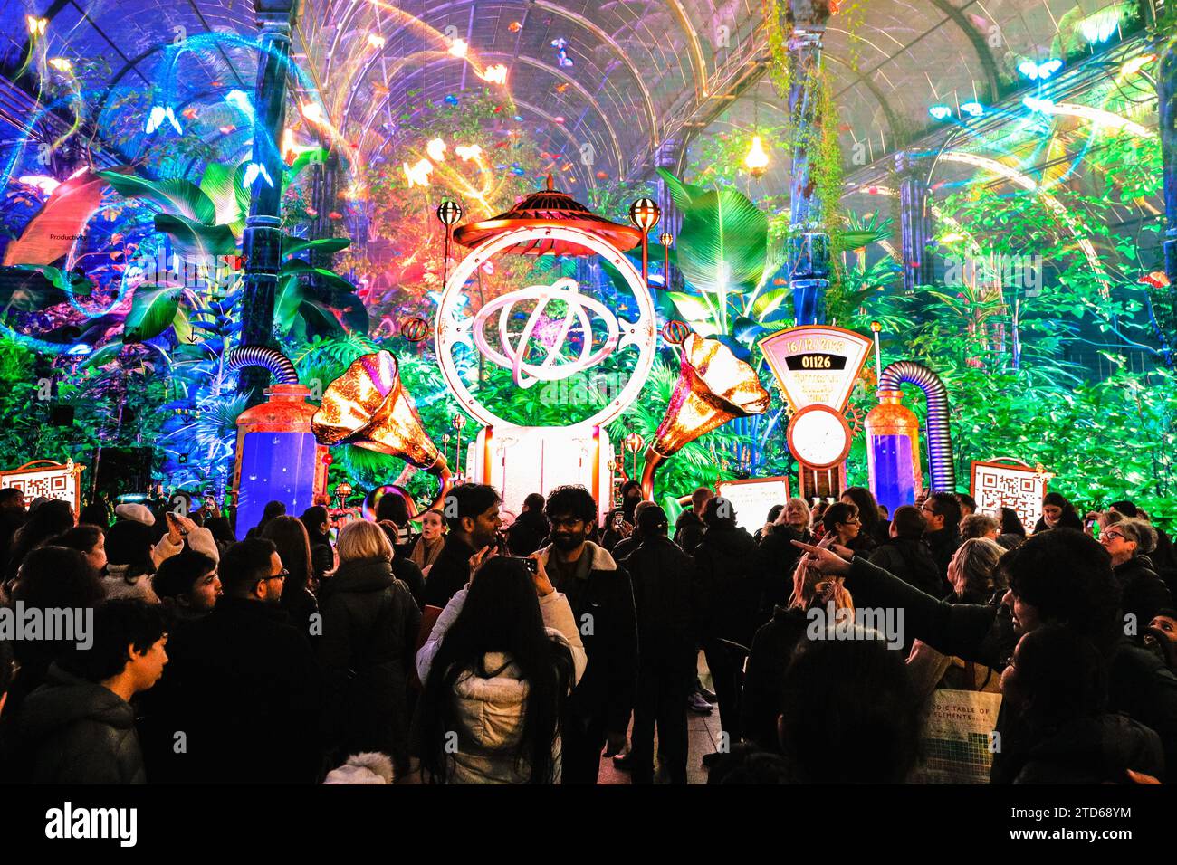 London, UK. 16th Dec, 2023. People watch the "The Butterfly Trail ...