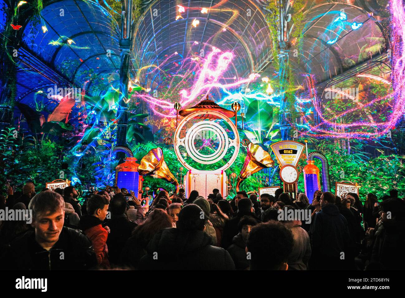 London, UK. 16th Dec, 2023. People watch the "The Butterfly Trail ...