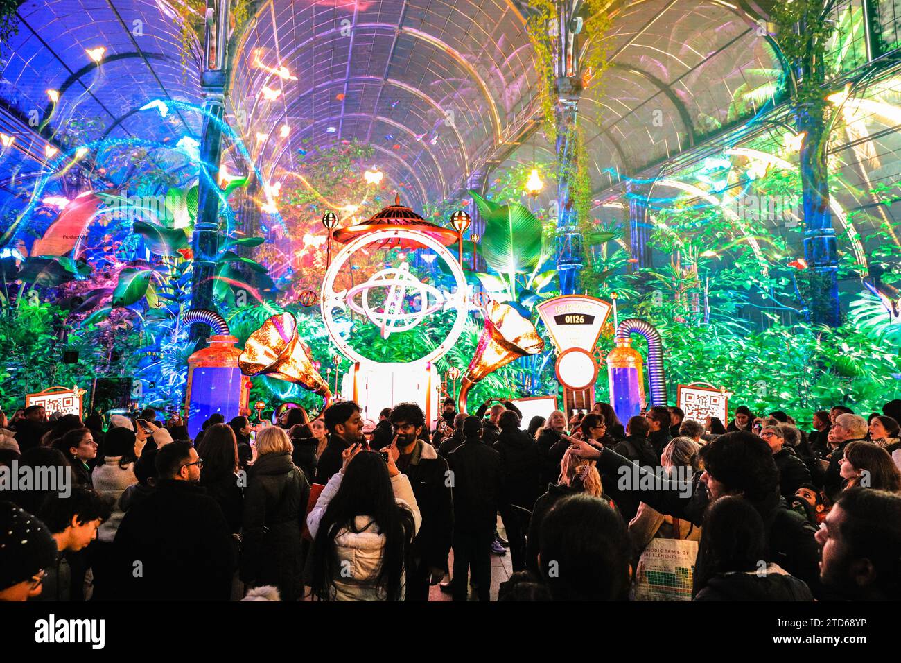 London, UK. 16th Dec, 2023. People watch the "The Butterfly Trail ...