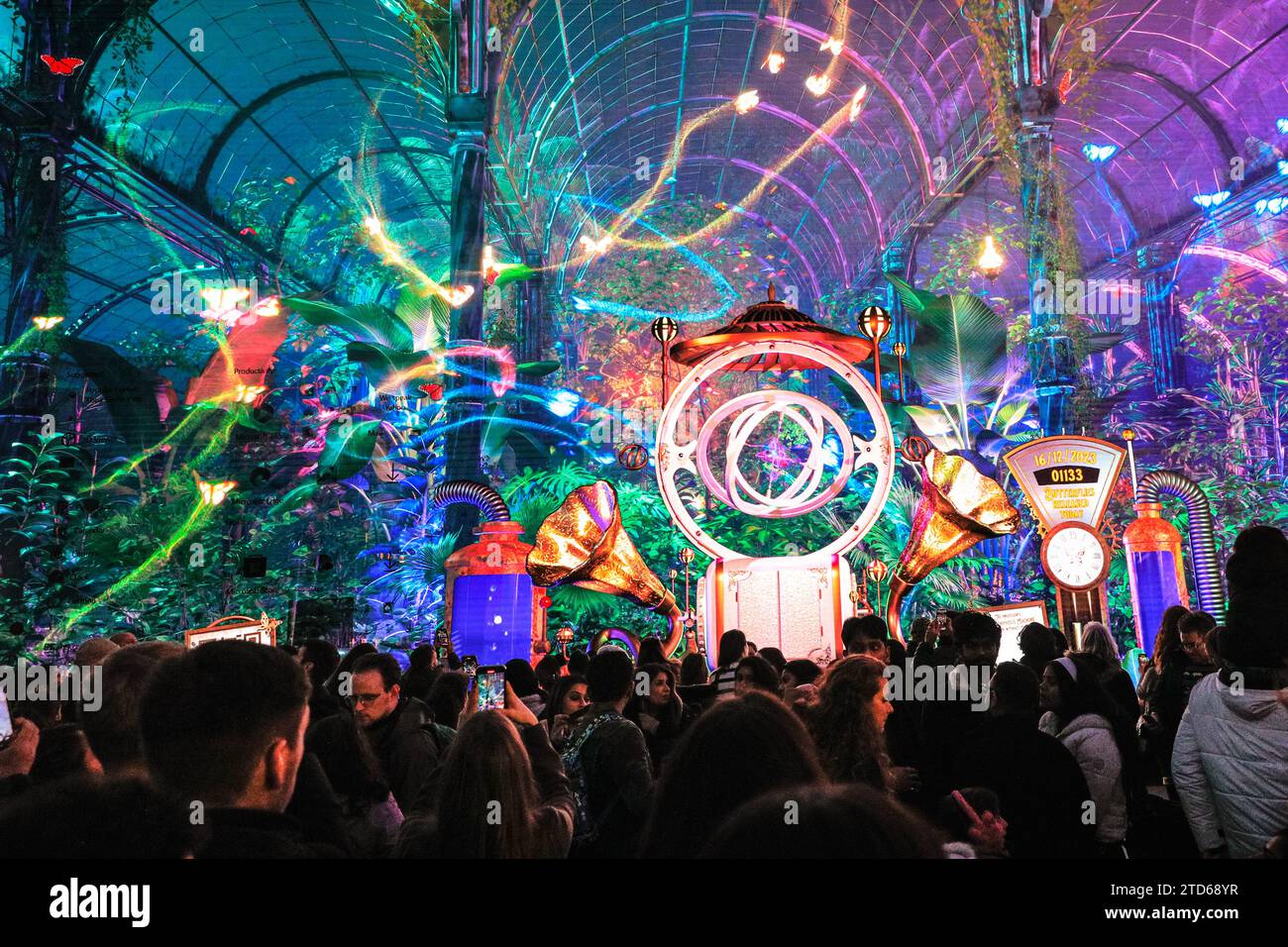 London, UK. 16th Dec, 2023. People watch the "The Butterfly Trail ...