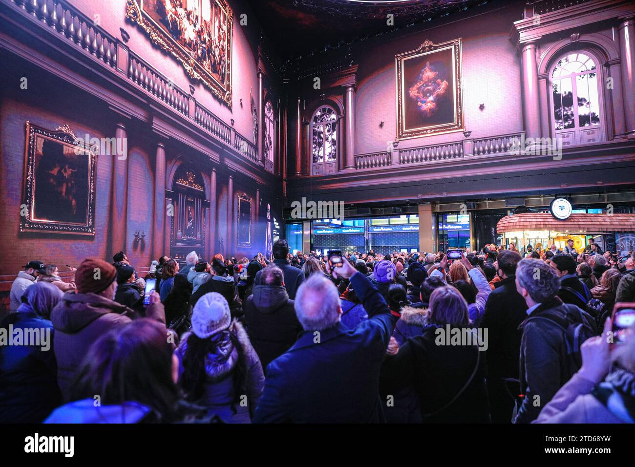 London, UK. 16th Dec, 2023. People watch the "Summer Palace ...