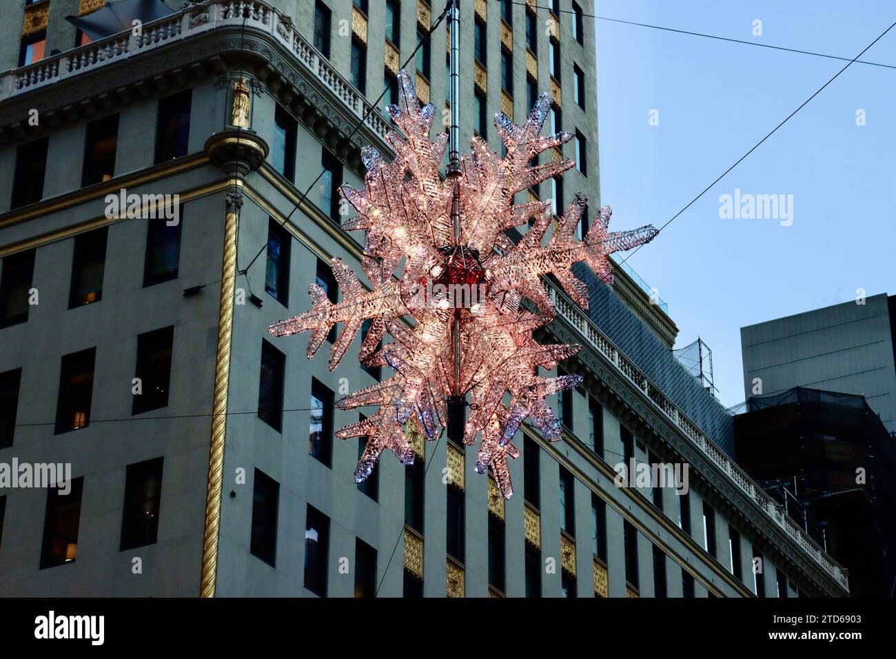 Giant Baccarat crystal snowflake over the corner of Fifth avenue and ...