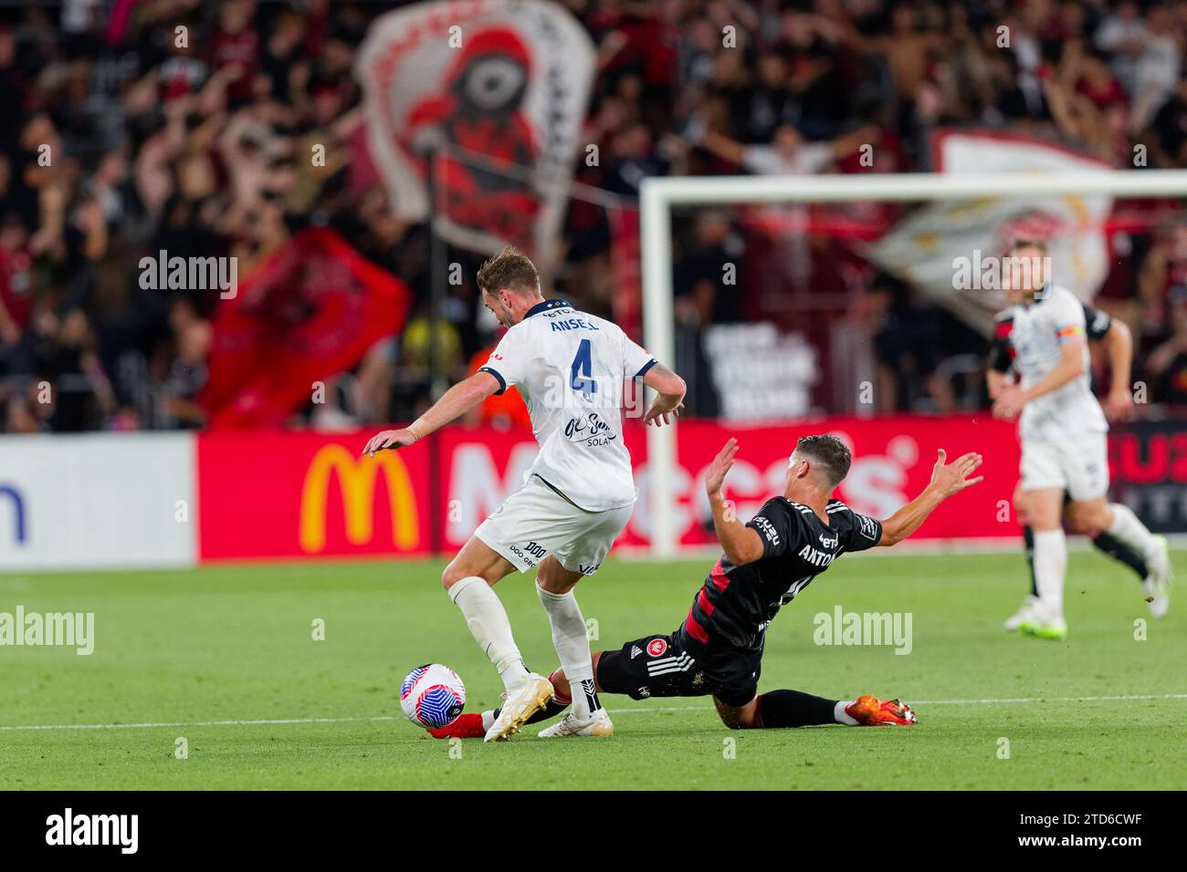 Marcus Antonsson of the Wanderers competes for the ball with Nicholas ...