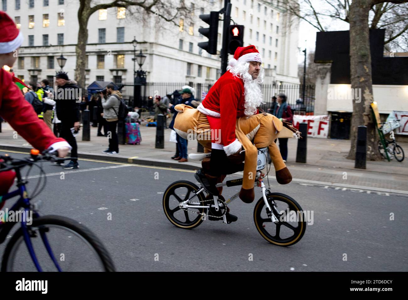 A participant seen riding his bike in his festive costume during the ...