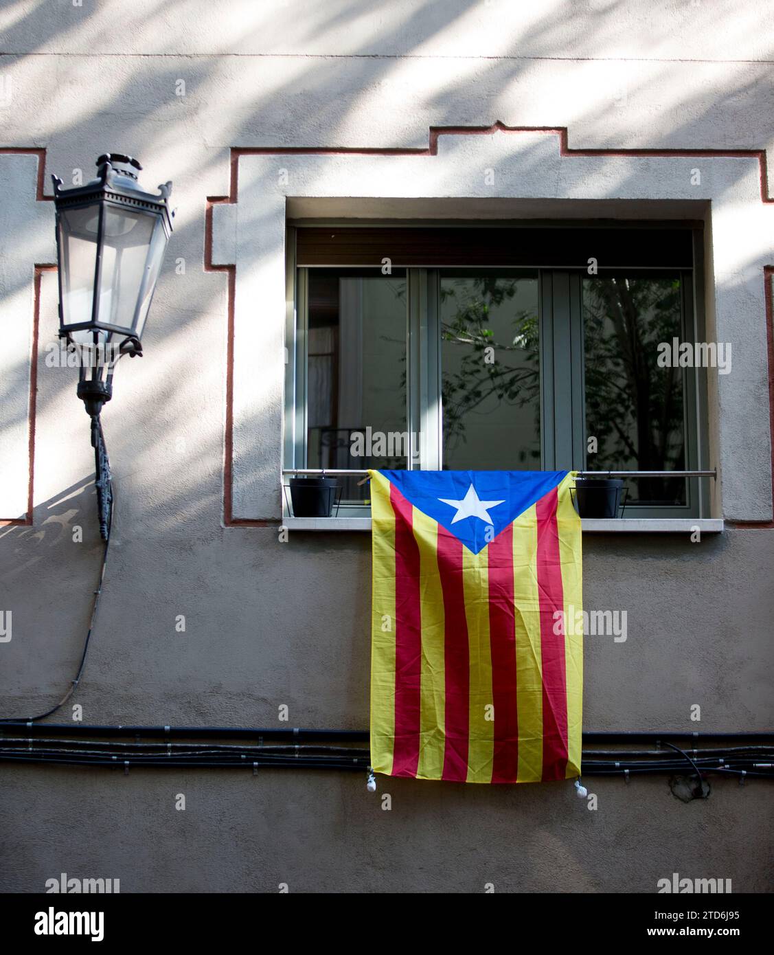 Barcelona, 09/28/2015. Catalan independence flag hanging from a building. Photo: Ignacio Gil ...