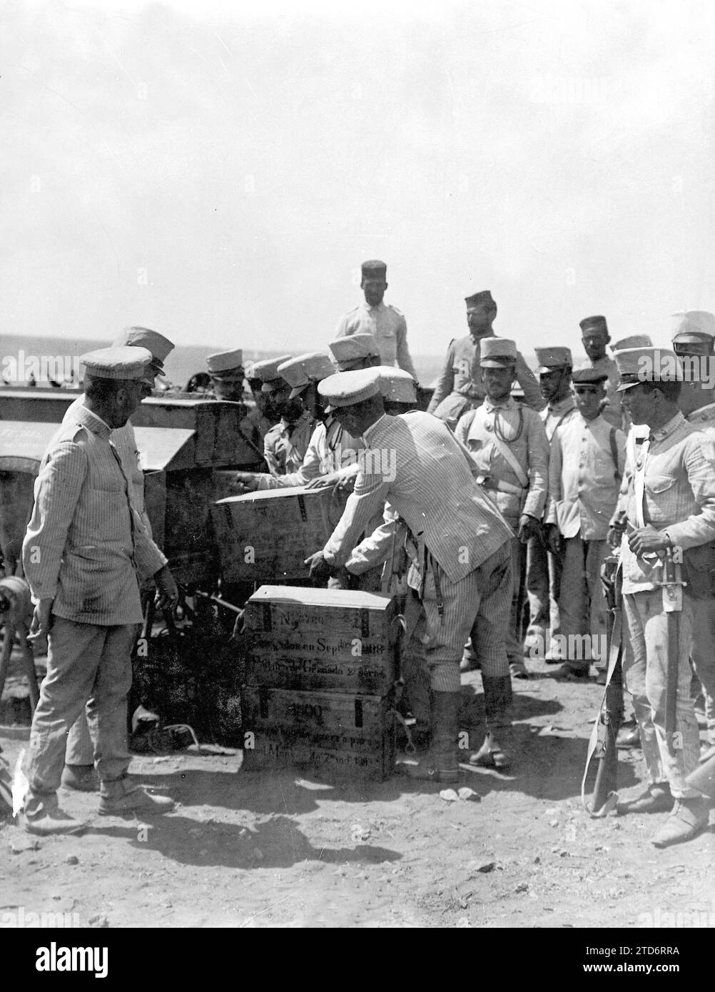 08/31/1909. Artillery in the Campaign. Unloading Ammunition from a ...