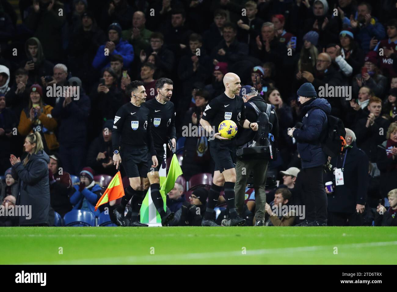 Burnley, UK. 16th Dec, 2023. Referee Anthony Taylor and his assistants ...