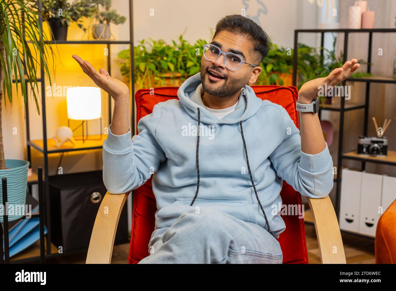 What. Why. Frustrated Indian man raising hands in indignant expression ...