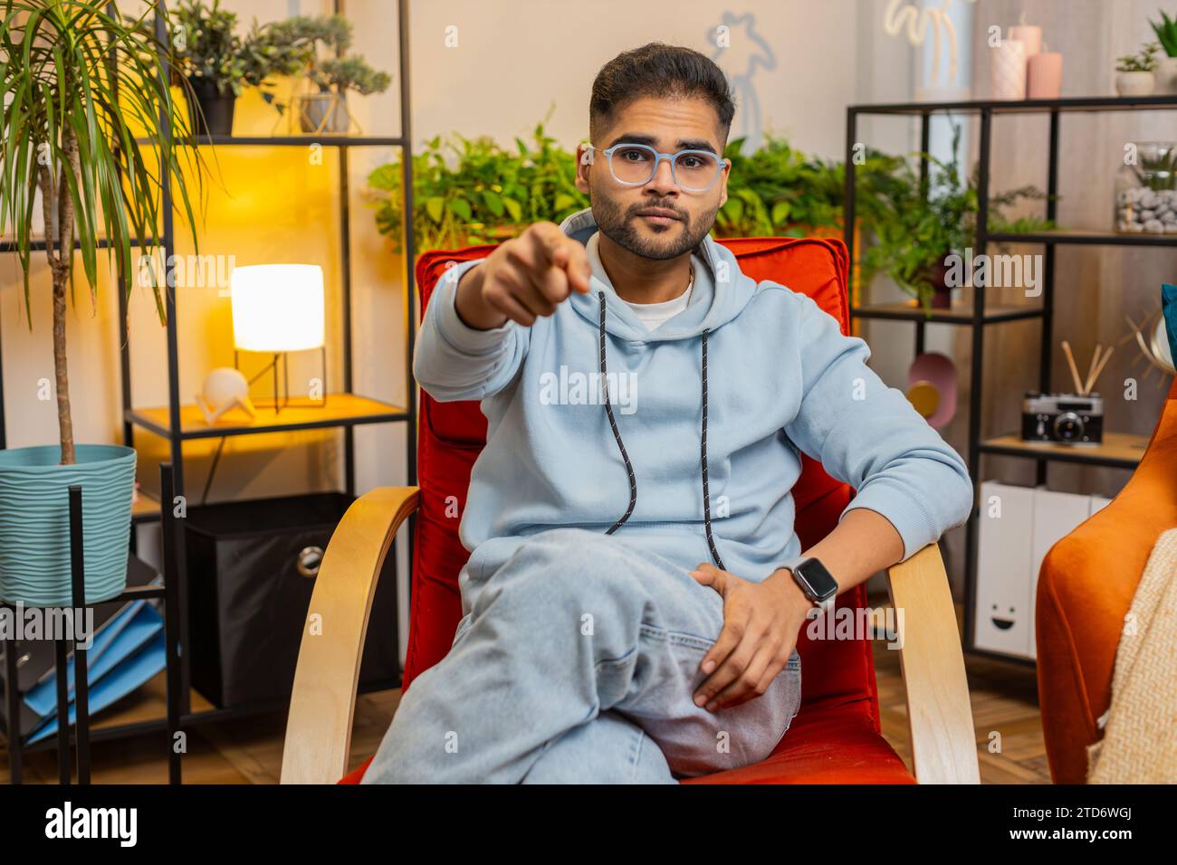 Hey you. Strict unhappy Indian man pointing hand finger to camera ...