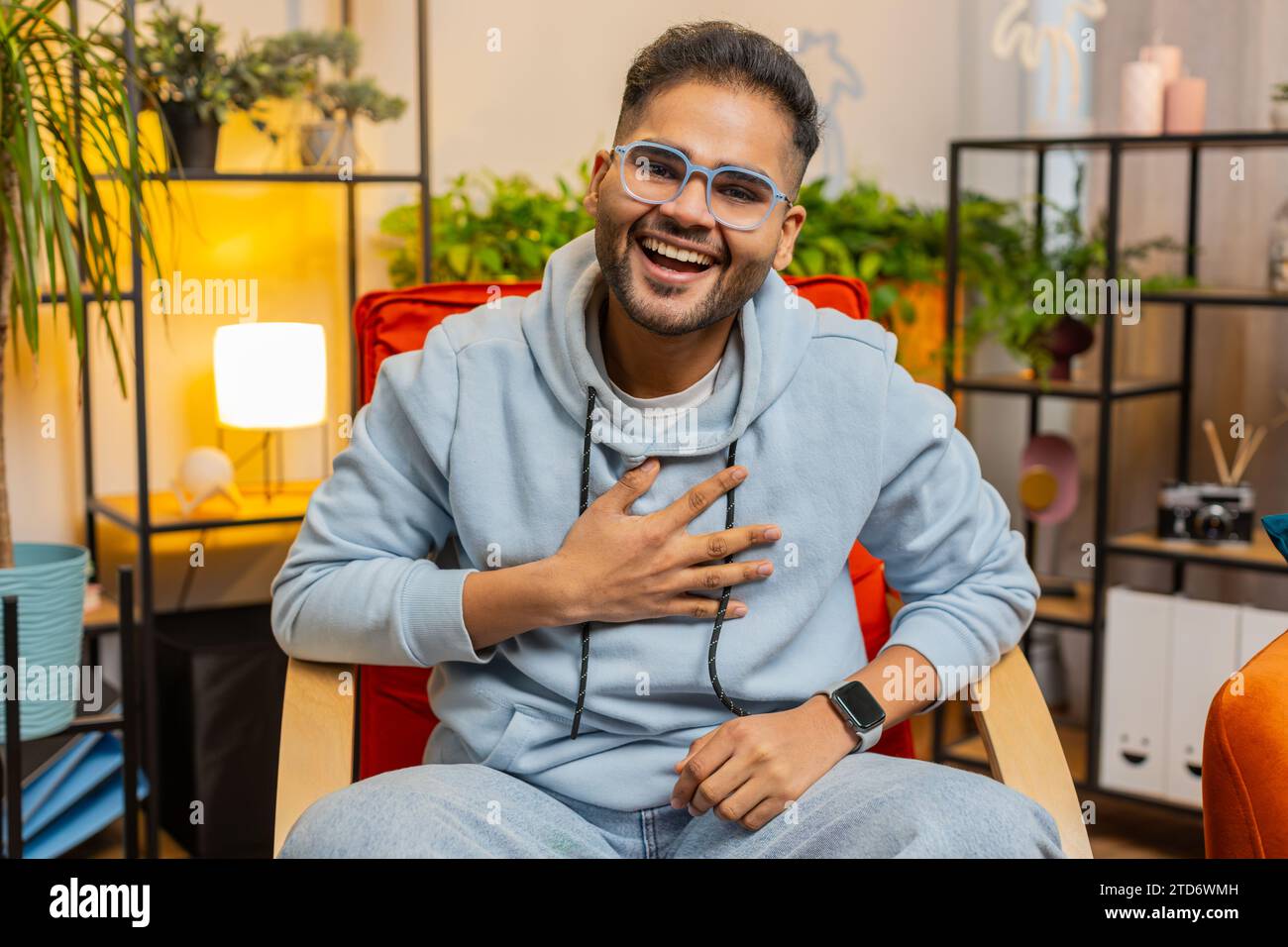 Happy excited Indian man laughing out loud after hearing ridiculous ...