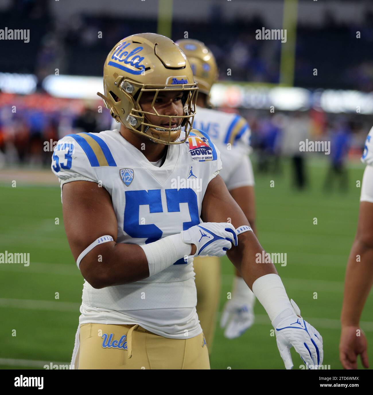 December 16, 2023 - UCLA Bruins linebacker Darius Muasau #53 warms up ...