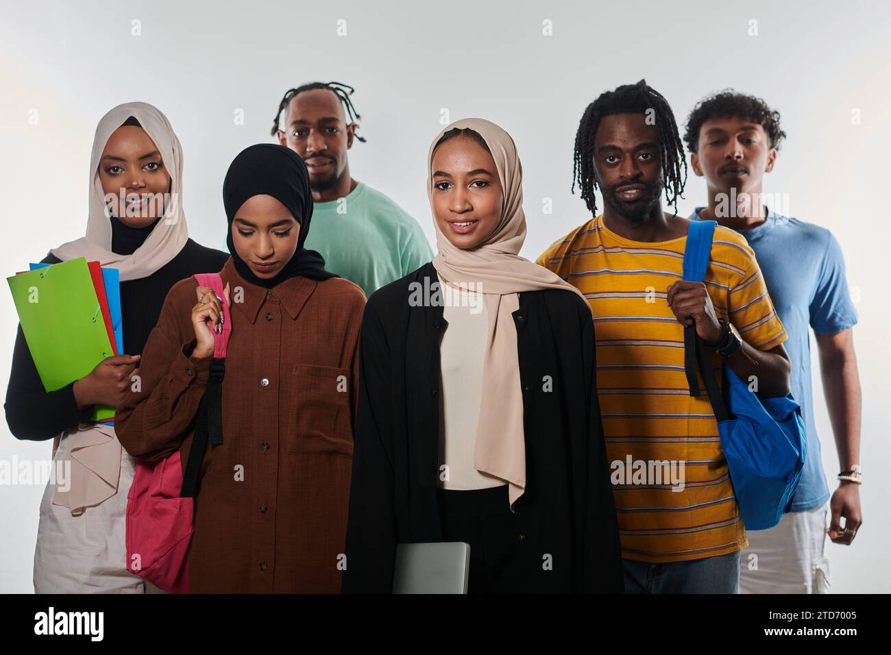 In a vibrant display of educational diversity, a group of students ...