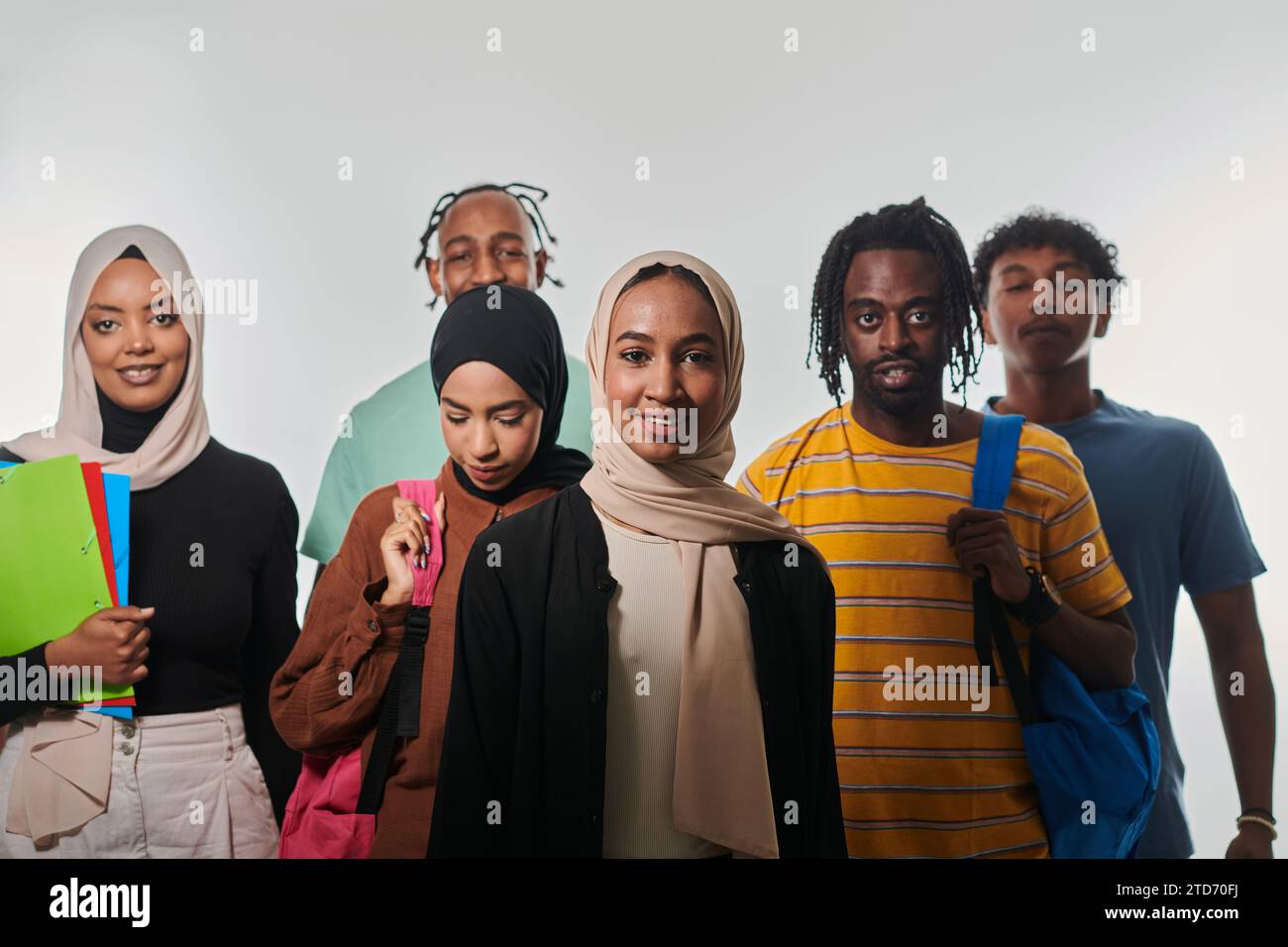 In a vibrant display of educational diversity, a group of students ...