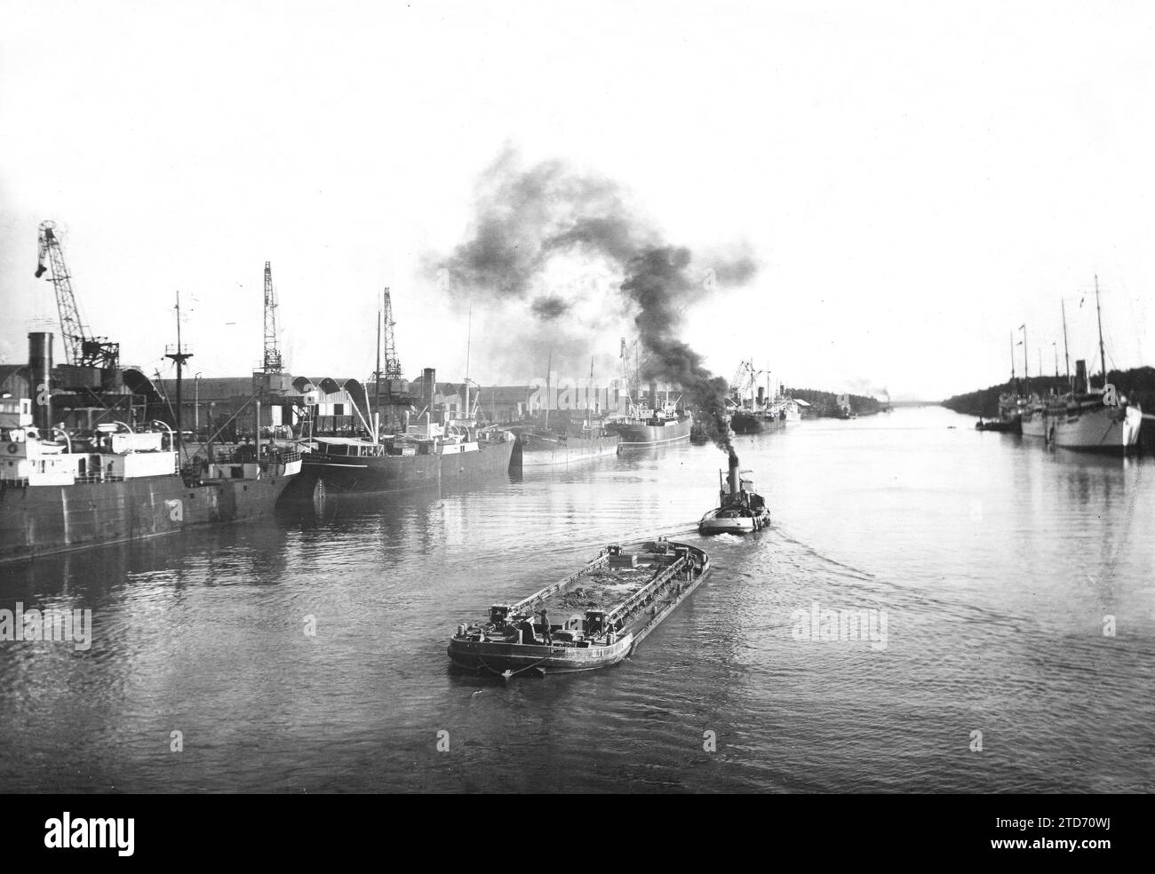 02/28/1931. Echoes of the Sirens of the Ships Set to Depart. Tugboat ...