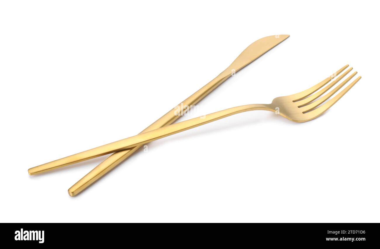 Shiny golden fork and knife isolated on white. Luxury cutlery Stock ...