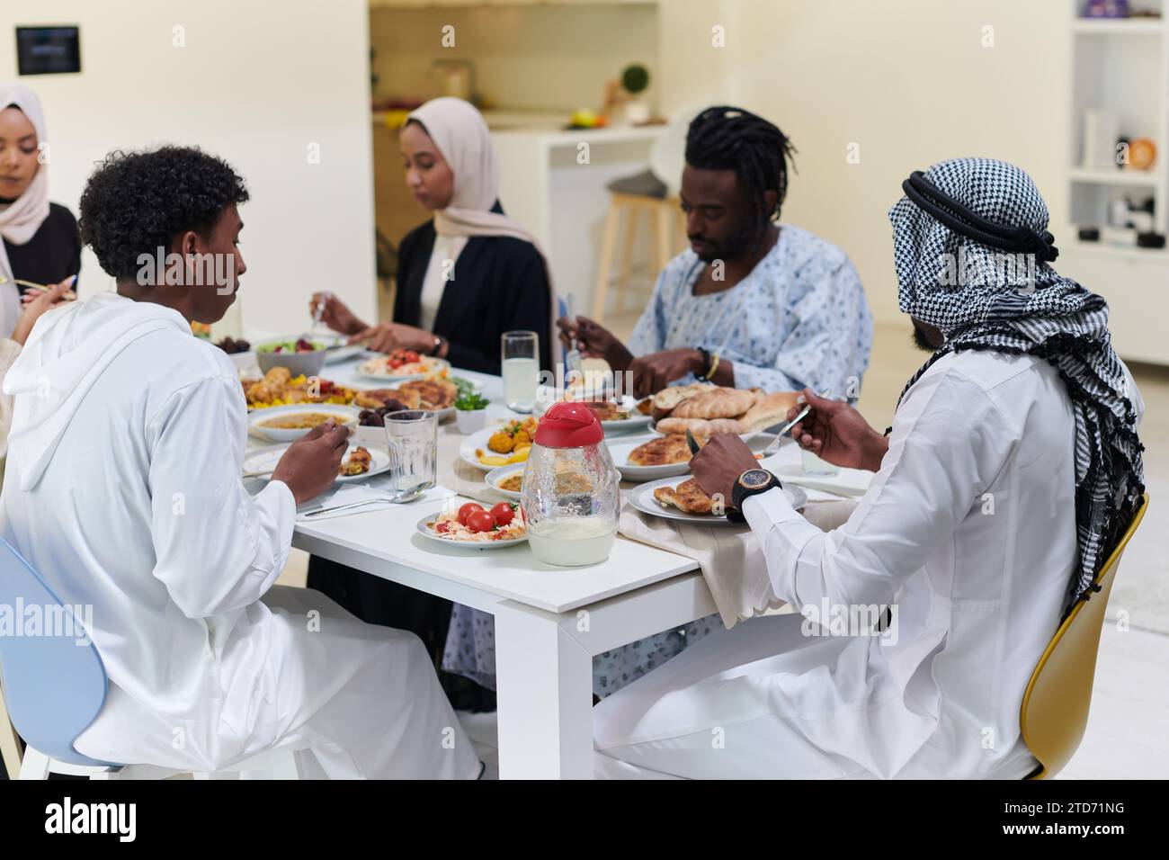 A traditional and diverse Muslim family comes together to share a ...