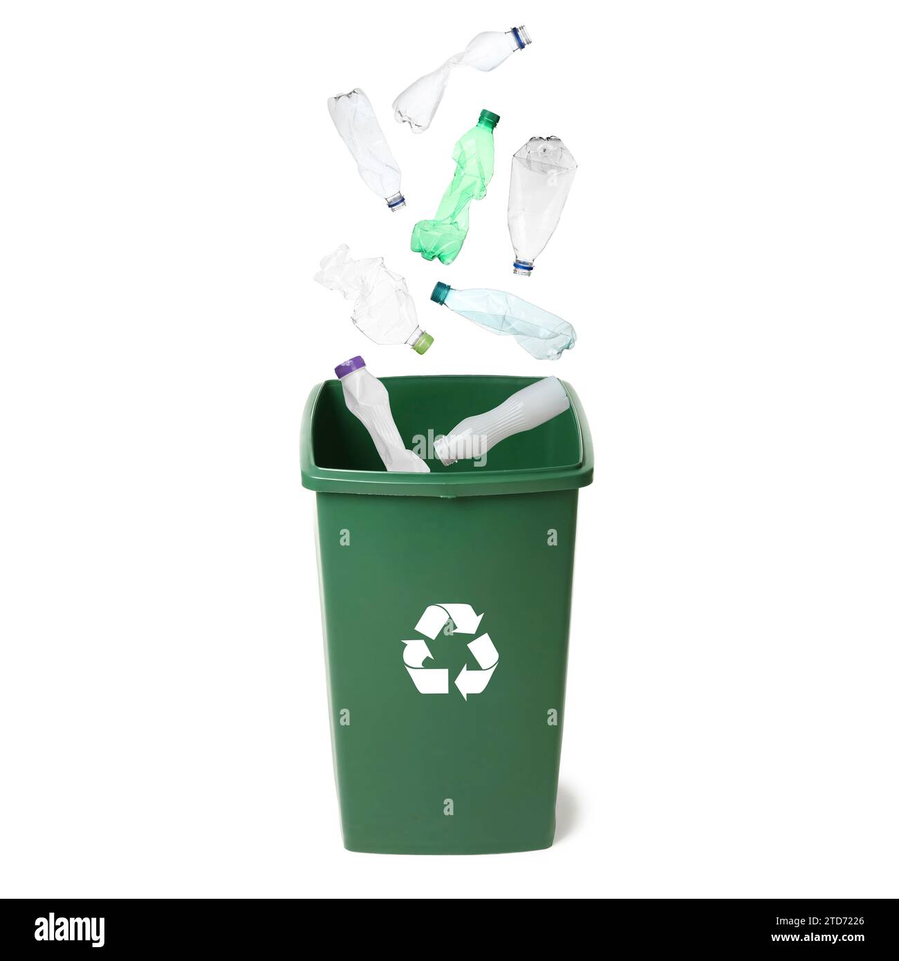 Garbage falling into trash bin on white background Stock Photo - Alamy
