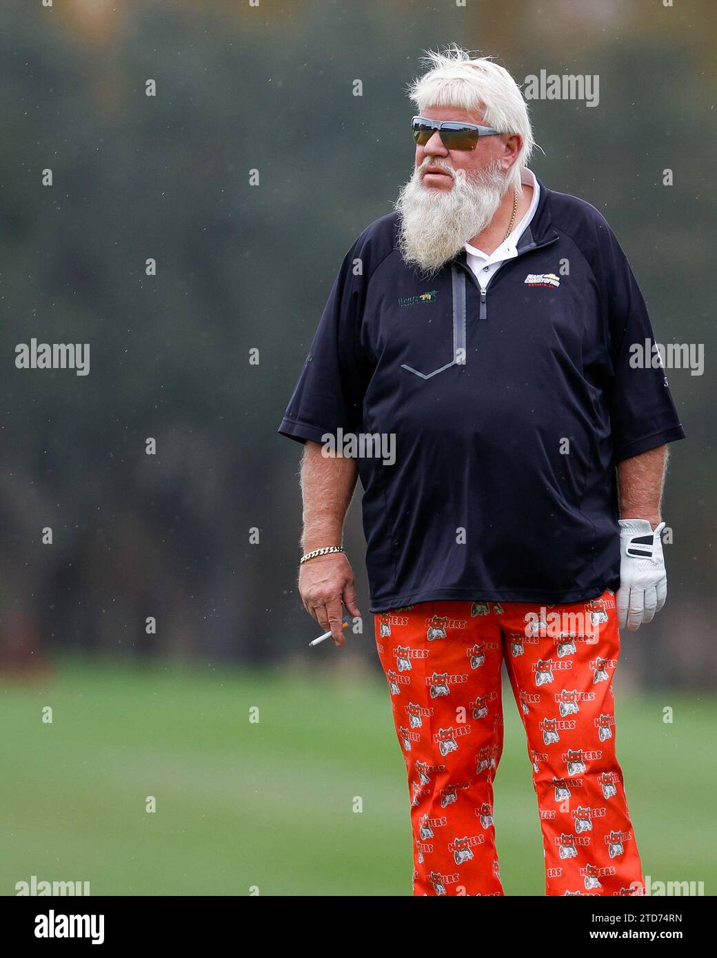 Orlando, Florida, USA. December 16, 2023: John Daly smoking a cigarette ...