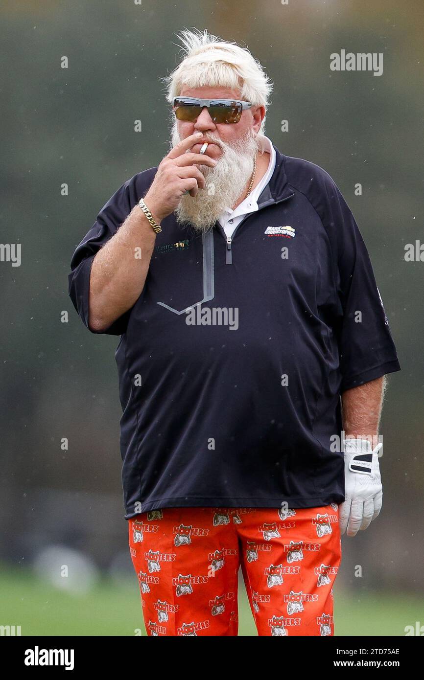 Orlando, Florida, USA. December 16, 2023: John Daly smoking a cigarette during Round One of the ...