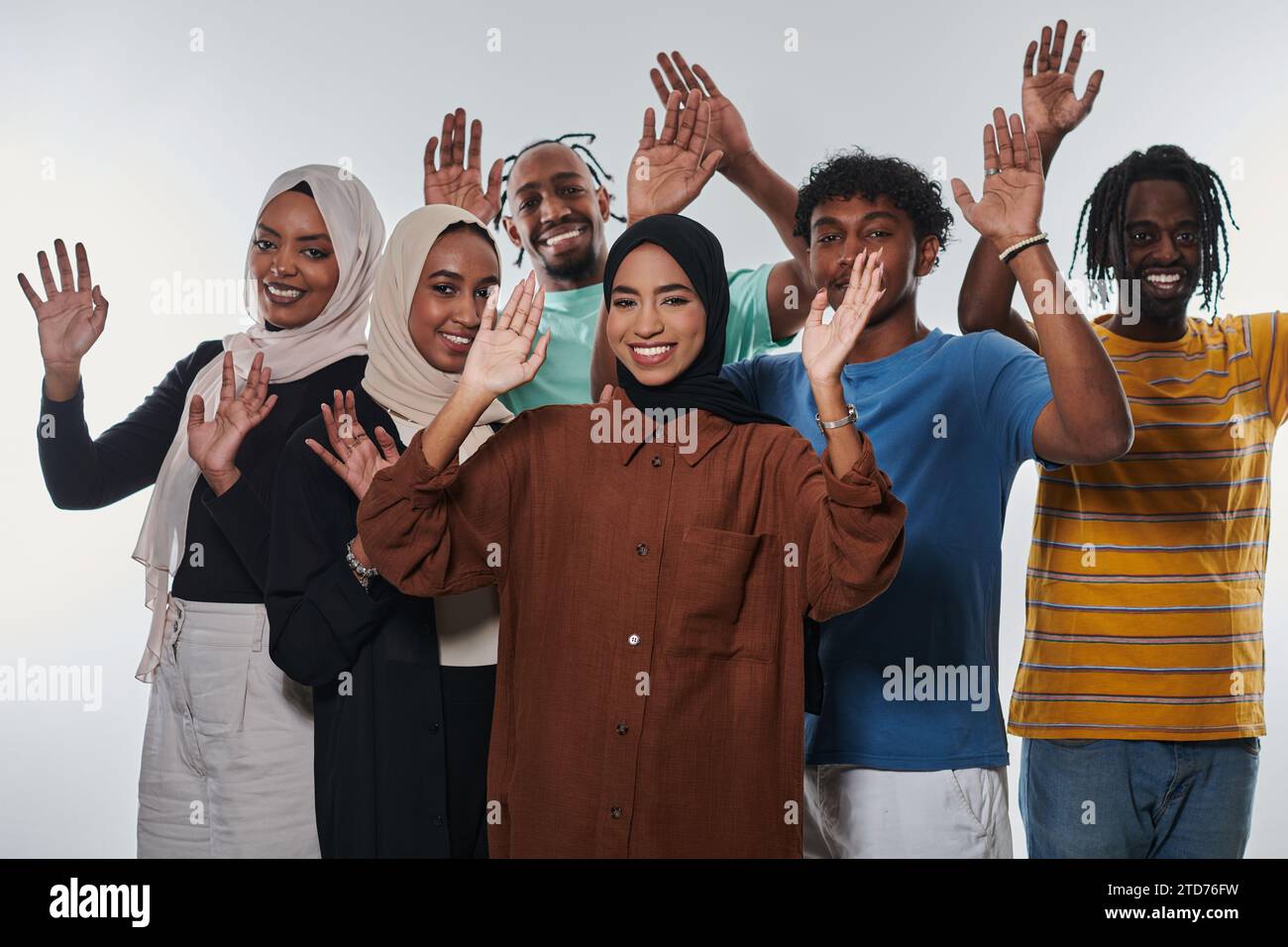 A jubilant and diverse group, including an African American man and ...