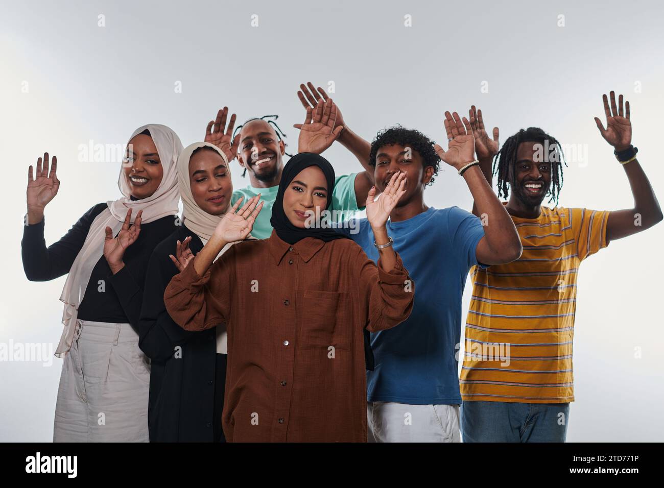 A jubilant and diverse group, including an African American man and ...