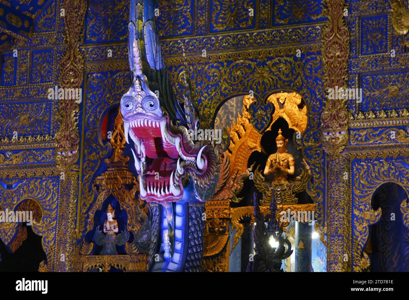 Night of Serpent front of the beauty blue chapel at Wat Rong Suea Ten ...