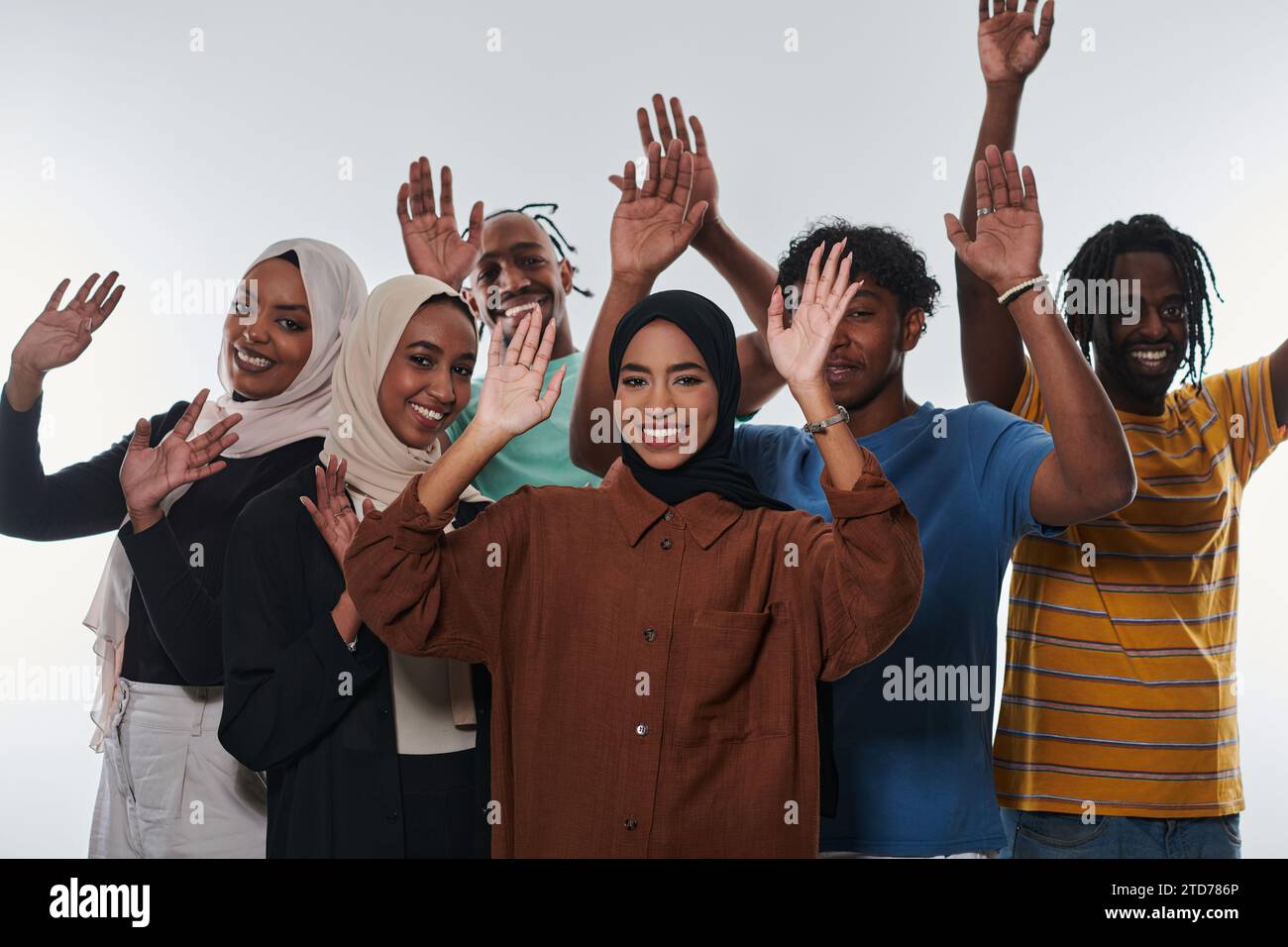A jubilant and diverse group, including an African American man and ...