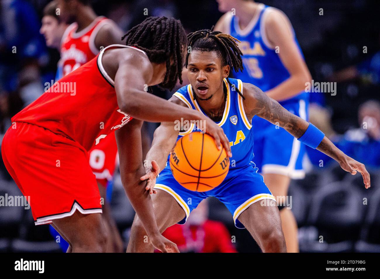 December 16, 2023: UCLA Bruins guard Dylan Andrews (2) pressures Ohio ...