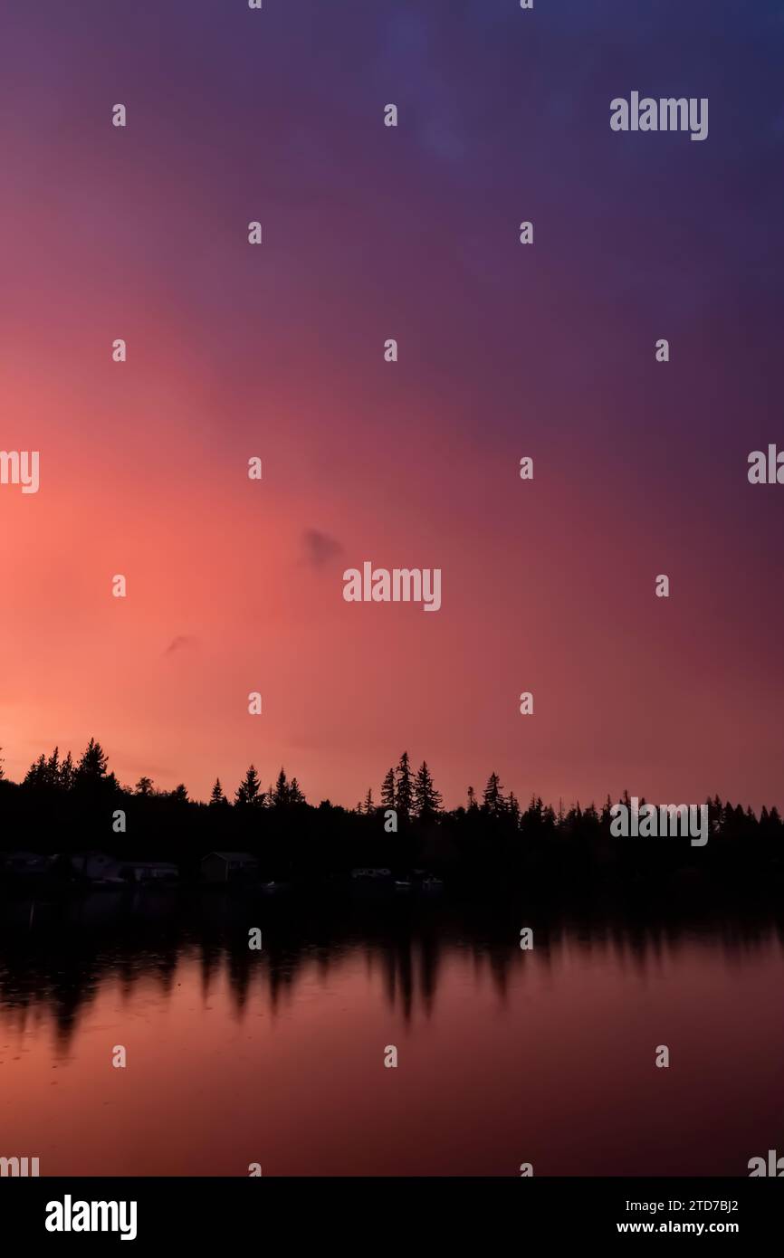 Rain and sunset on Fawn Lake, Olympic Peninsula, Washington State, USA ...