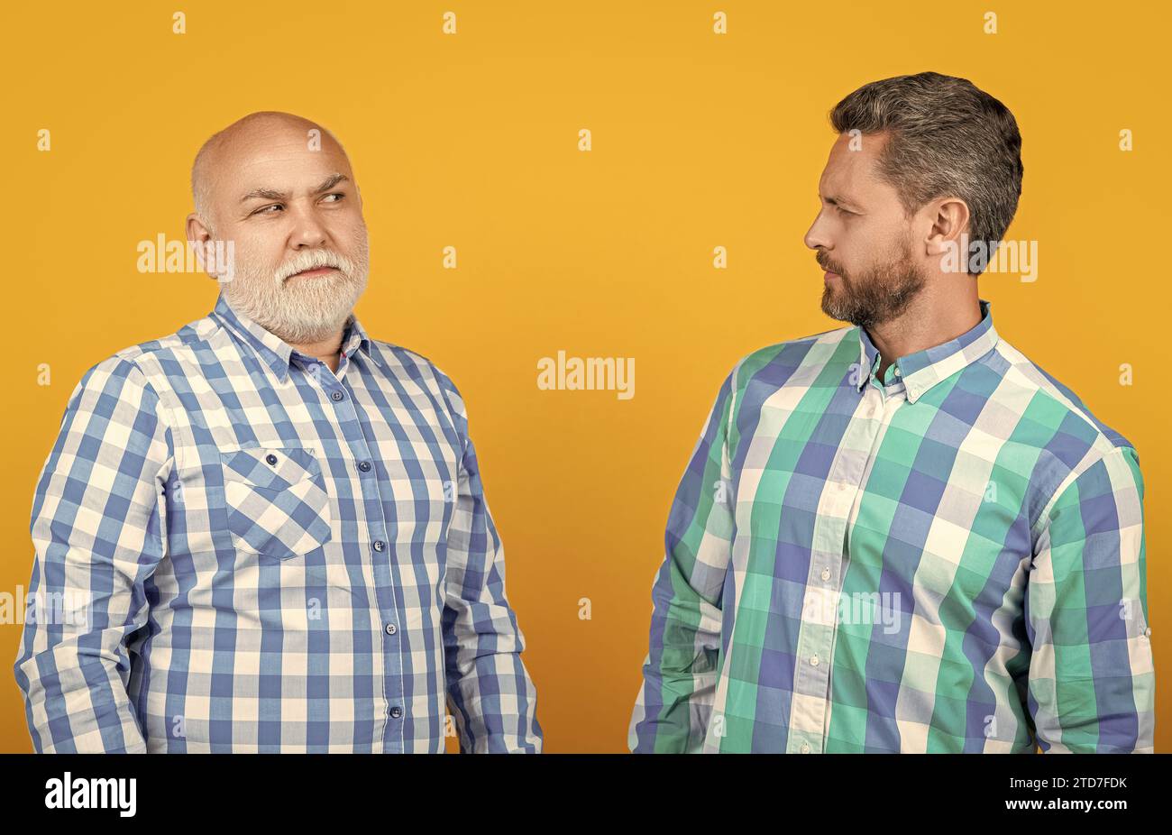 puzzled two generation family relationship isolated on yellow ...