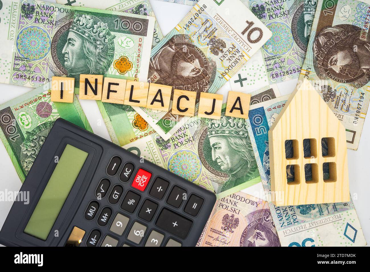 Polish word "inflacja" inflation with wooden house Polish zloty ...