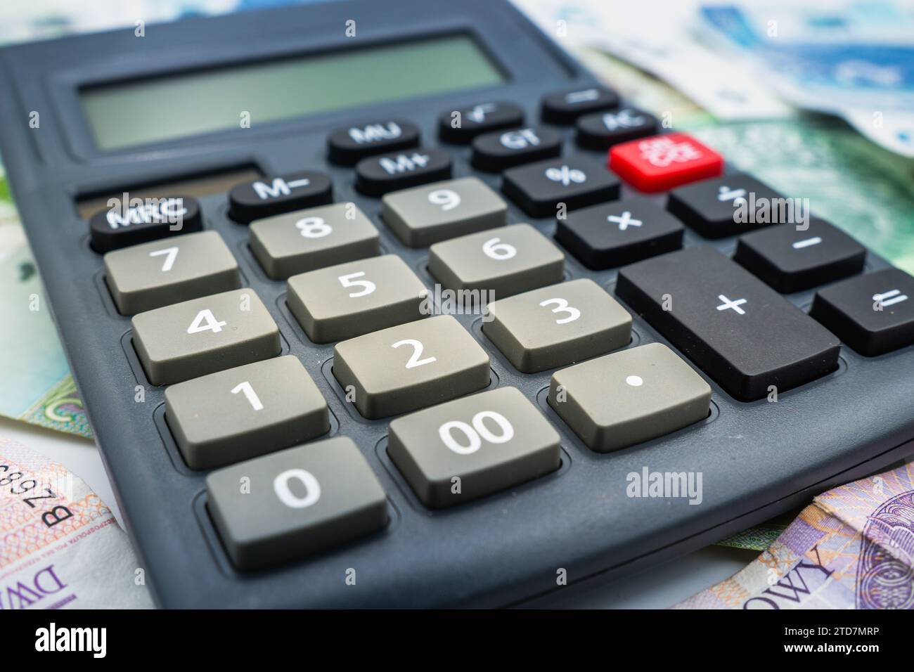 lose up on a Calculator accounting concept Polish zloty banknote ...