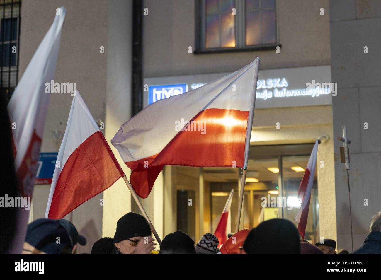 a waving Polish flags and the Polish Television TVP logo in the ...