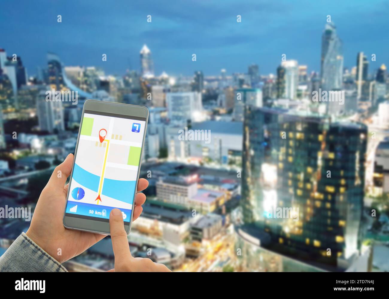 Using the navigation system or GPS smartphone mobile phone to navigate to your destination Stock ...