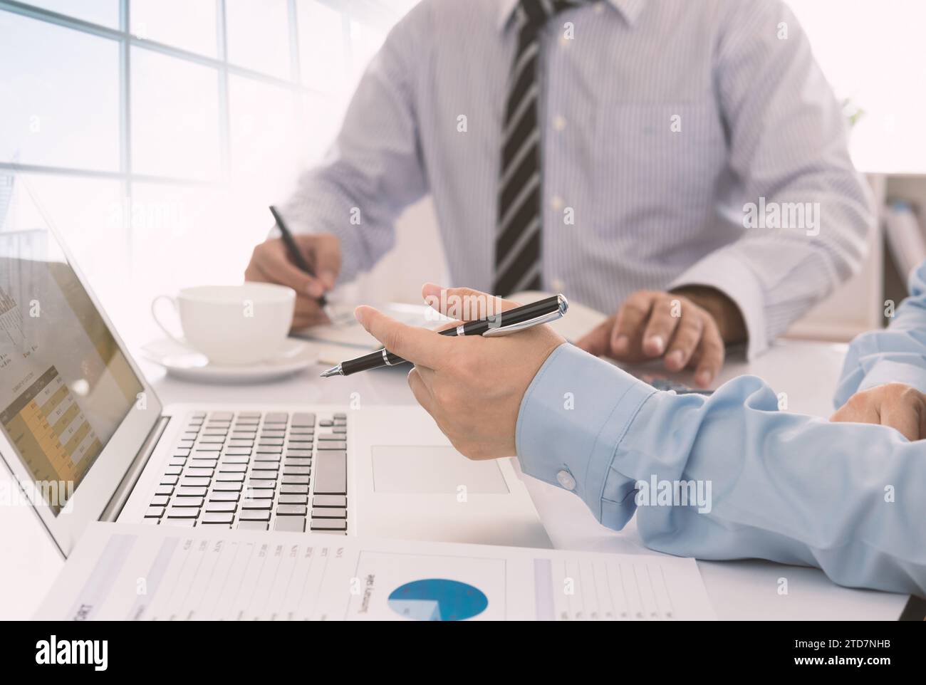 Businessmen are analyzing market data to clients or partners have been ...