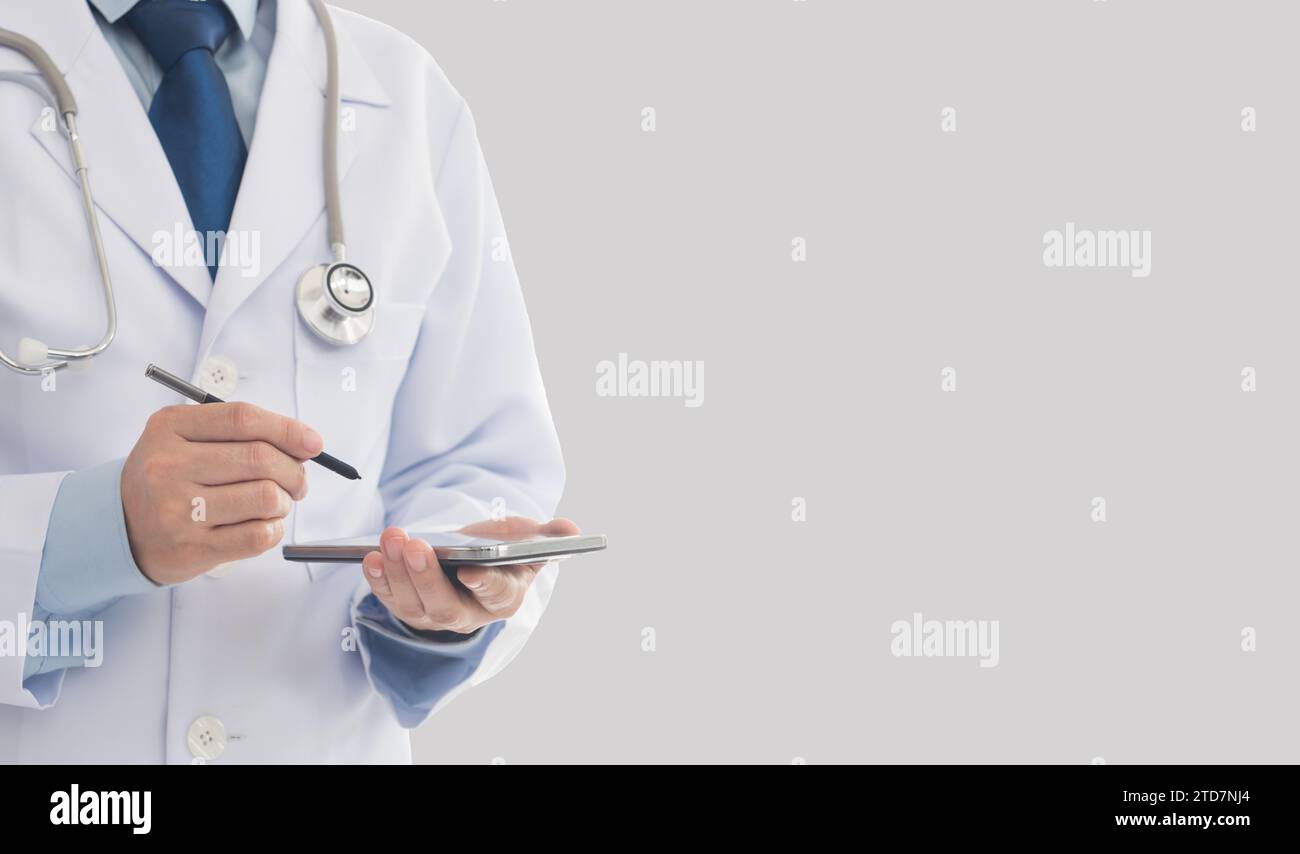 Doctor using a smart phone with copy space. Concept of healthcare and ...