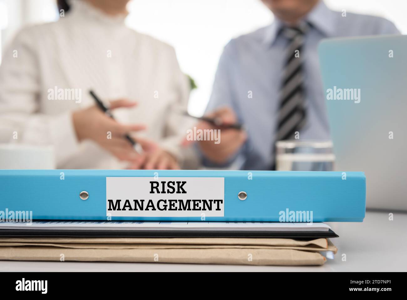Risk management document file put on the table in the conference room ...