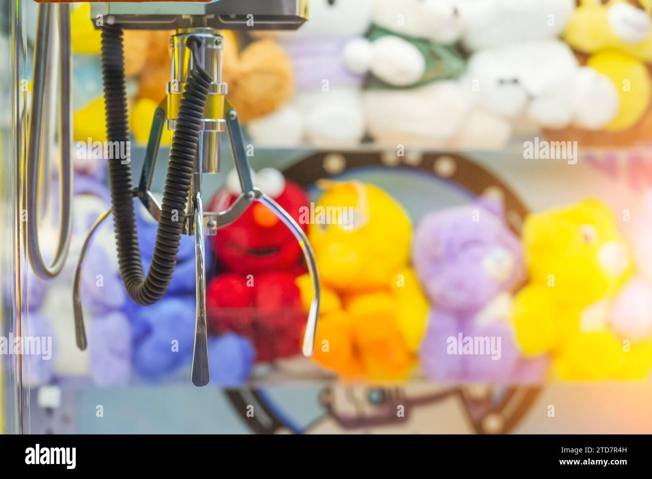 Toy crane vending machine, claw game or cabinet to catch the toys ...
