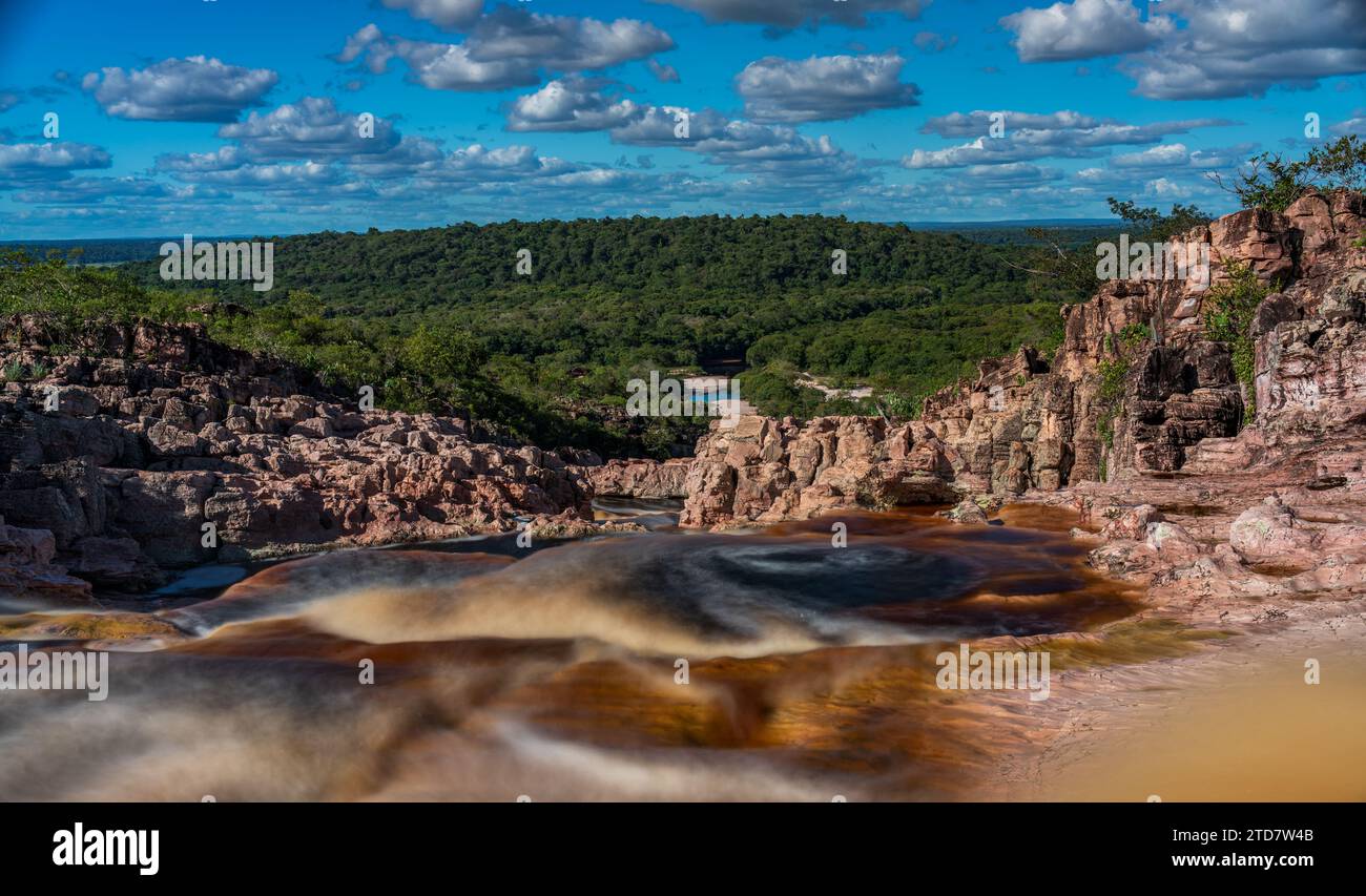 Breathtaking View of Cascading Water Over Rocky Riverbed Stock Photo ...