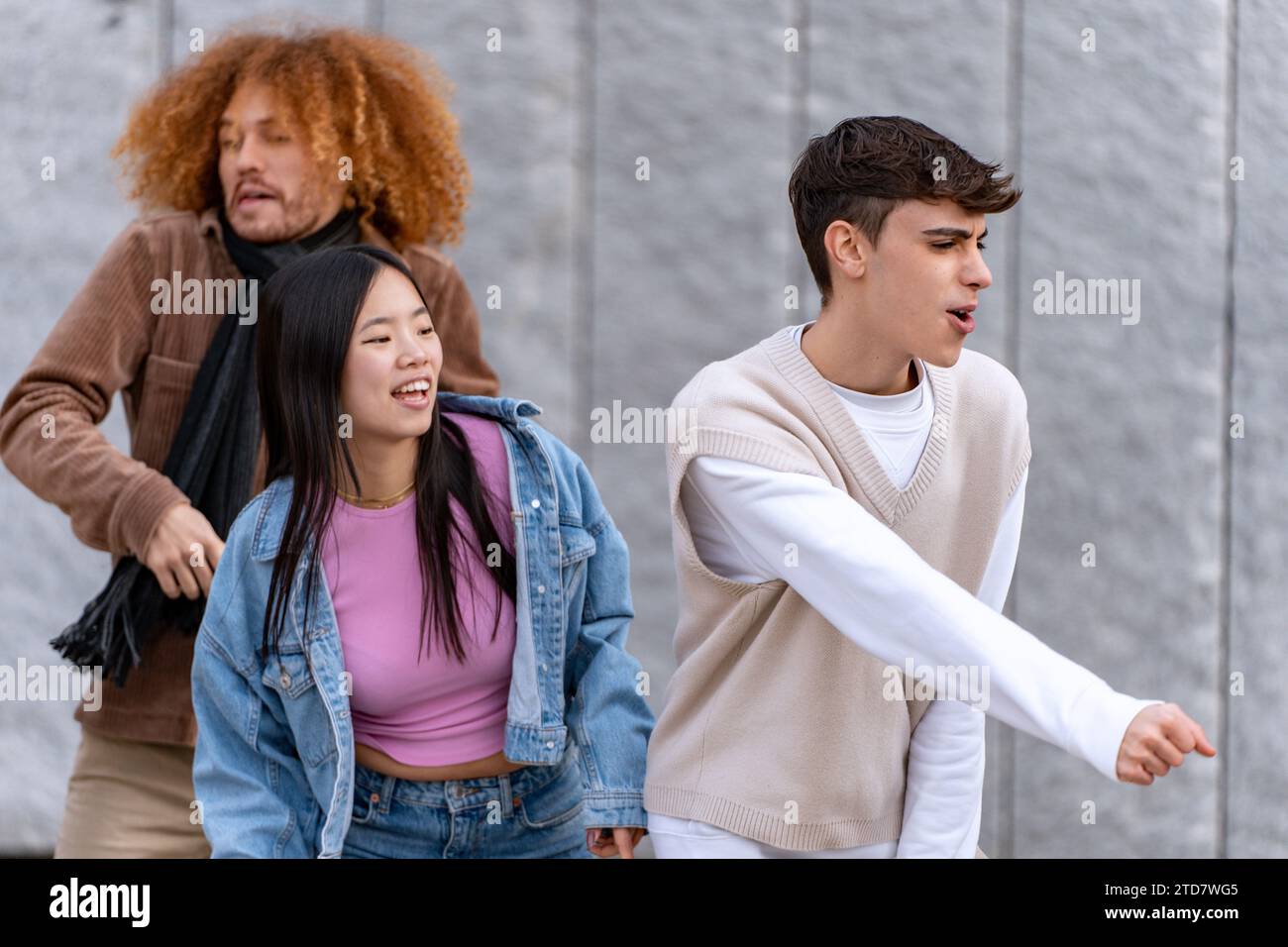 Animated young adults in mid-dance, expressing joy and energy against ...