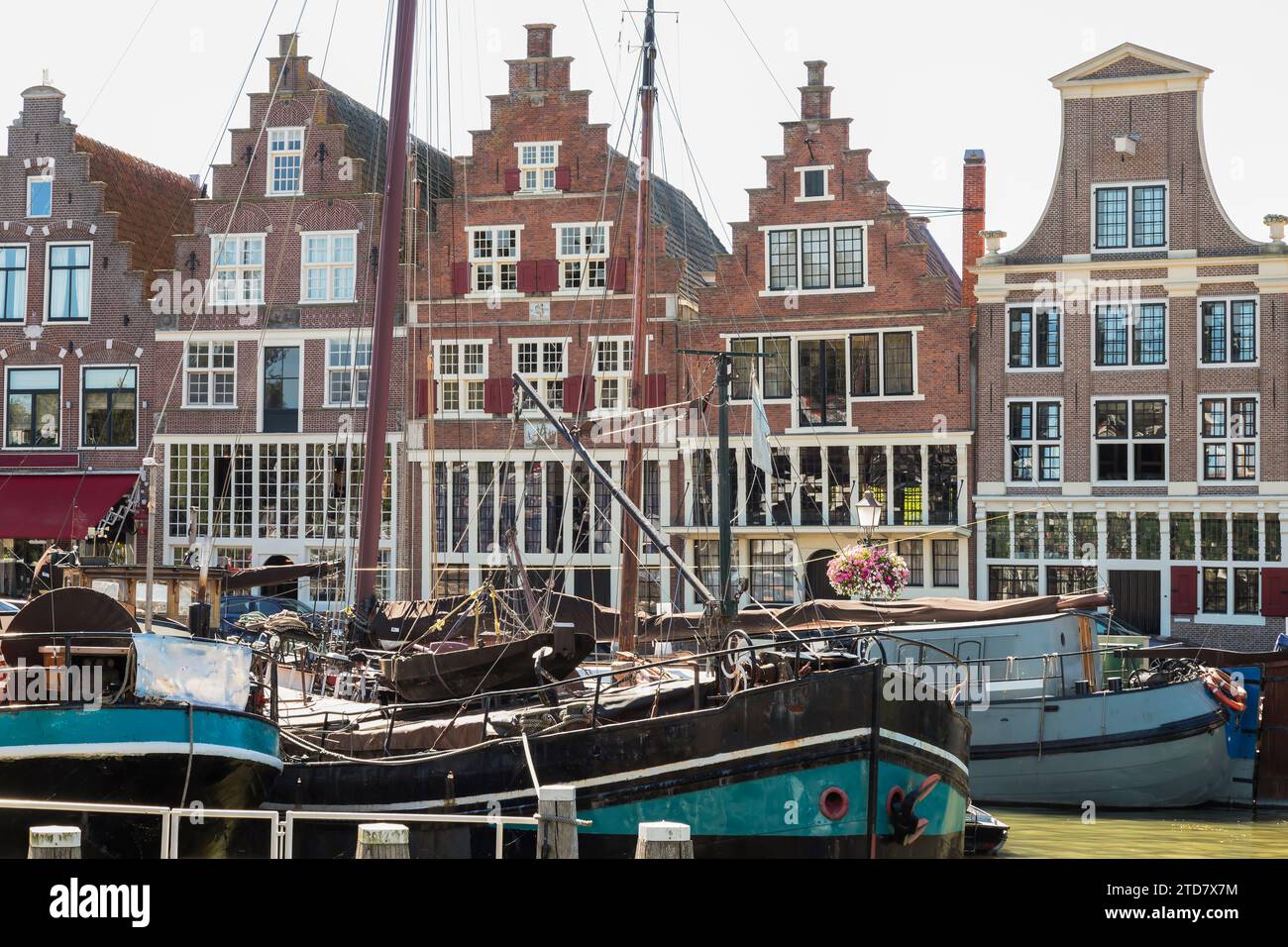 Historic canal houses with beautiful facades in the old harbor of the ...