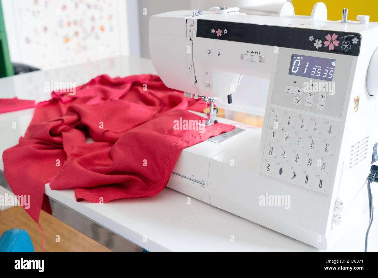 Sewing background with unfinished dress Stock Photo - Alamy