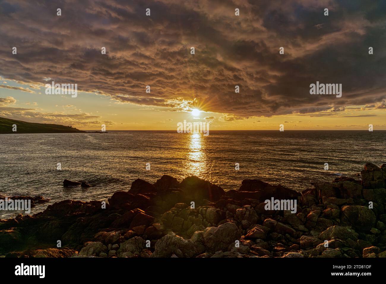 Sunset with dramatic clouds near Porthmeor Beach in St Ives, Cornwall ...