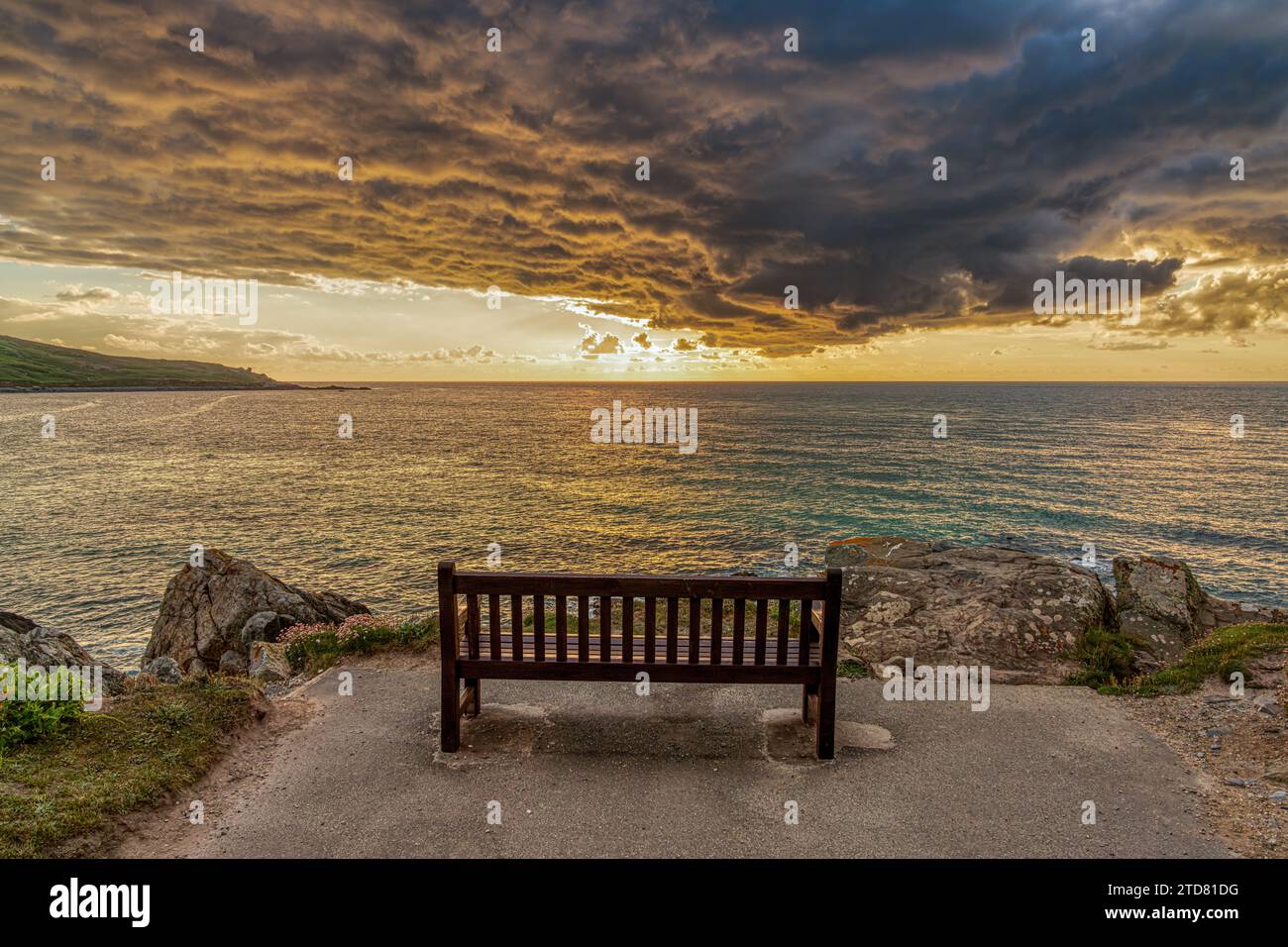 Sunset with dramatic clouds near Porthmeor Beach in St Ives, Cornwall ...