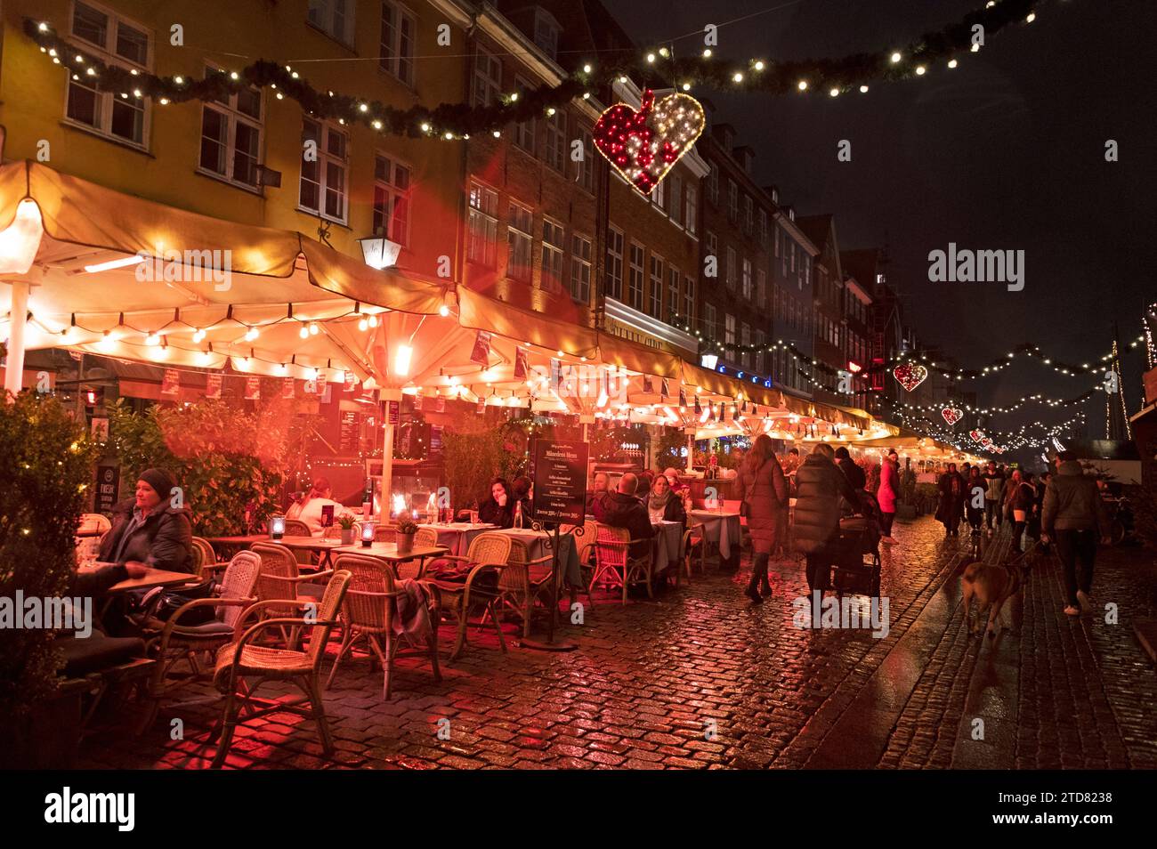 Brave diners keeping warm with provided restaurant blankets and sitting ...