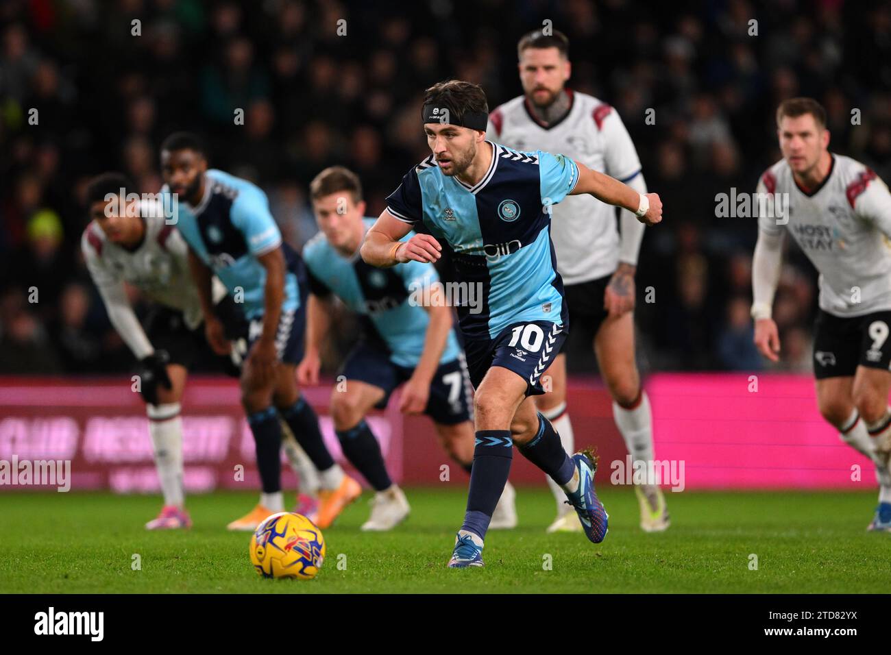Derby, UK. 16th Dec, 2023. Luke Leahy of Wycombe Wanderers runs up to ...