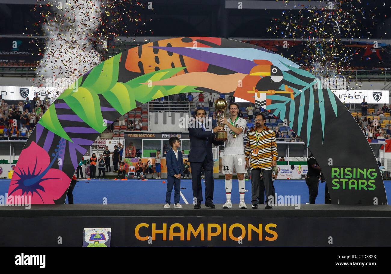 Poljaric Matteo of Germany (C) receiving the winner trophy after ...